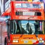 NYC Night Bus Sightseeing Tour with Free Statue of Liberty Cruise - Transportation, Timing & Group Size