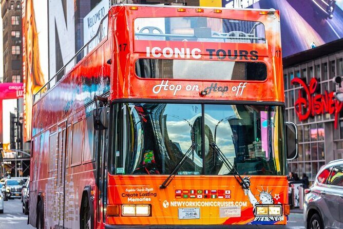 NYC Night Bus Sightseeing Tour with Free Statue of Liberty Cruise - Transportation, Timing & Group Size