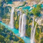 Tamul waterfall and water cave on a wooden canoe - Authentic Experiences and Traveller Feedback