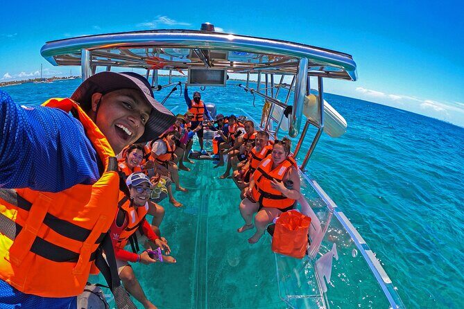 Tour Isla Mujeres excursion in Collective Transparent Boat - A Closer Look at the Experience