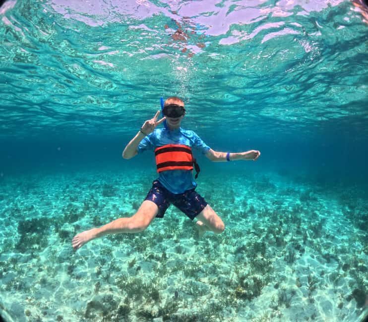 Cancún Catamaran to Isla Mujeres + Snorkel, Open Bar & Lunch - Playa Norte and Beach Time