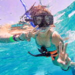 Cancun: Isla Mujeres Catamaran Tour with Open Bar of Drinks - The Experience at a Glance