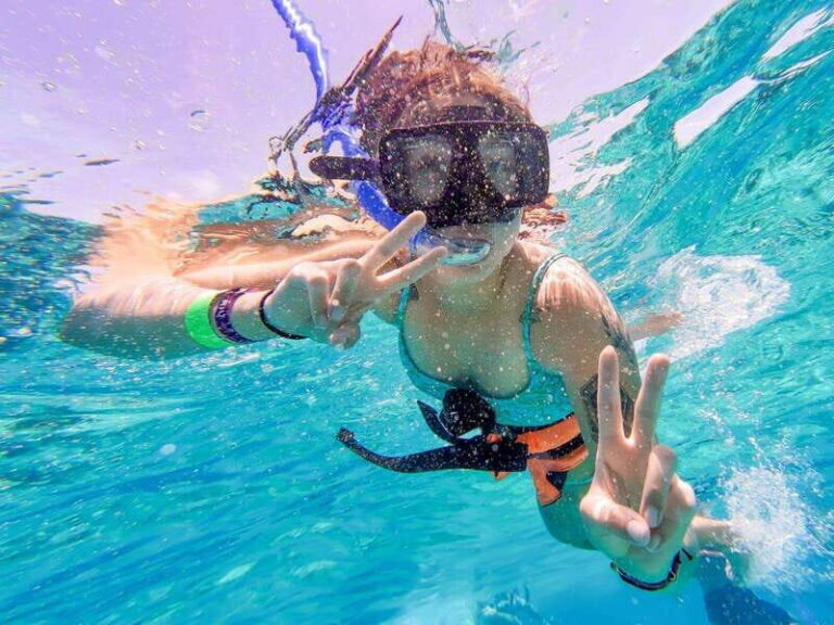 Cancun: Isla Mujeres Catamaran Tour with Open Bar of Drinks - The Experience at a Glance