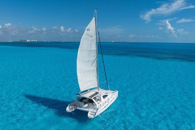 Isla Mujeres Day Tour with Catamaran, Snorkeling & Beach Club - Who Should Consider This Tour?