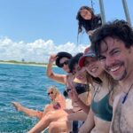 Isla Mujeres Full-Day Catamaran Tour  Buffet, Open Bar & Pickup - Practical Aspects and Tips