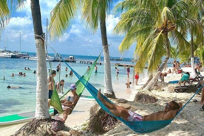 Live this unique experience. Catamaran to Isla Mujeres Tour. Open Bar included. - Authentic Insights from Past Travelers