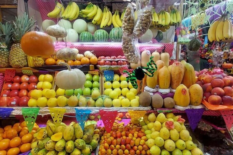 Mexico City: Guided Bike Tour of Culture and Local Taste - Exploring Mercado de Medellín