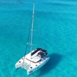 Private Catamaran Tour to Isla Mujeres - Beach Club Stop and Cultural Exploration