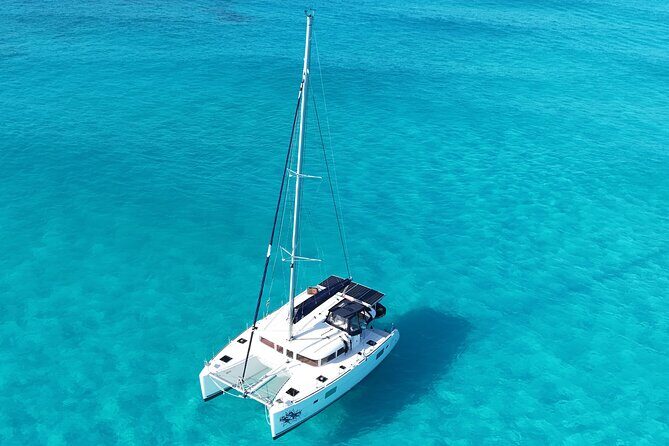 Private Catamaran Tour to Isla Mujeres - Beach Club Stop and Cultural Exploration