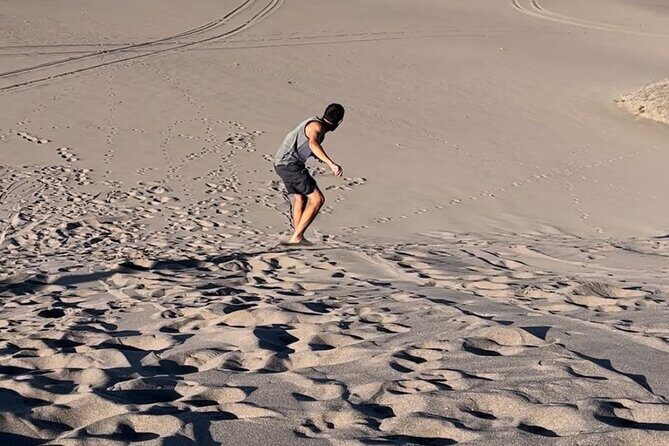 Slide into the sunset by Sandboarding in Las Dunas Del Mogote - Transportation, Group Size, and Overall Value