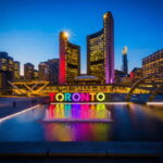 Toronto: Small Group Night Tour with Harbour Boat Cruise - Exploring the Distillery District