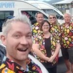 Corporate Bus, Private bus transfer. Cairns City - Cairns Airport. - Deep Dive into the Experience