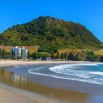 Mount Maunganui, Tauranga Day Tour from Auckland - Relaxing at Papamoa Beach