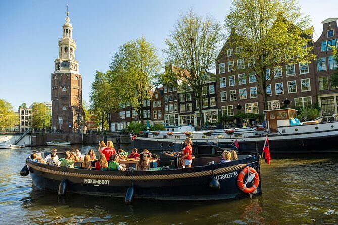 Amsterdam: Guided Open Boat Canal Cruise Unlimited Drinks Option - Experience Quality and Comfort
