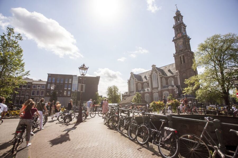 Amsterdam: Hidden Gems & Highlights Guided Bike Tour - Detailed Breakdown of the Itinerary