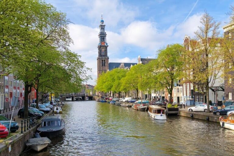 Amsterdam Walking Tour and Canal Cruise - The Canal Cruise: Seeing Amsterdam from a New Perspective