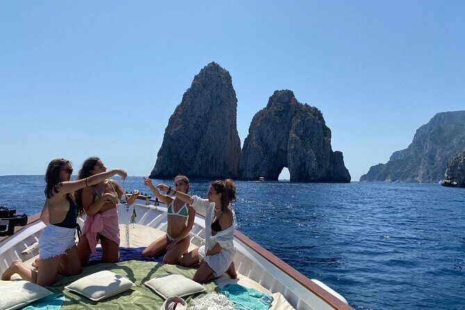 Capri Boat Tour: Grottoes, Swim & Sip Limoncello in a Small Group - Authentic Experiences and Review Insights