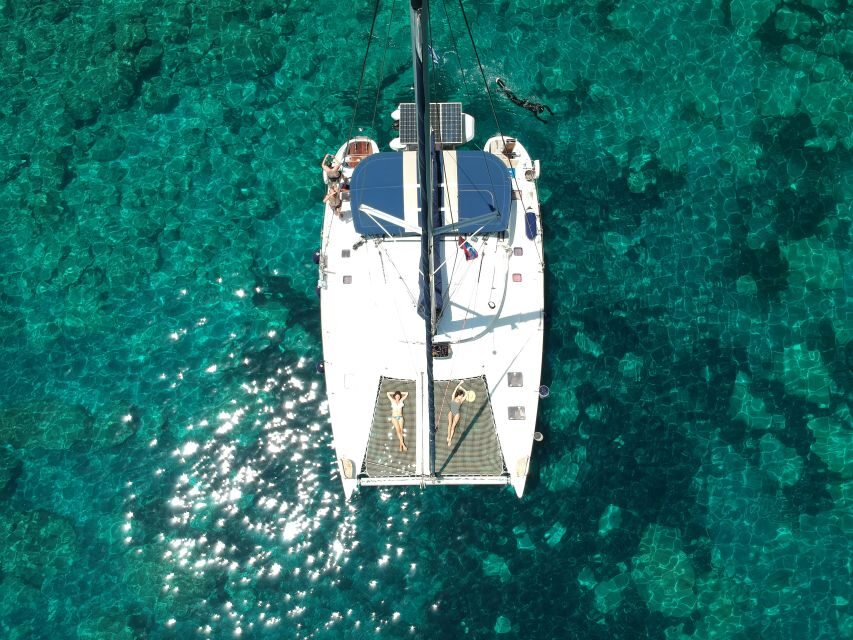 Milos: Full-Day Catamaran Cruise with Paddle Board - Exploring Each Stop: What Makes Them Special