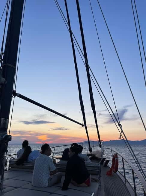 Mykonos: Sunset Boat Cruise with Light Dinner & Drinks - Dining and Drinks: A Light Fish Feast