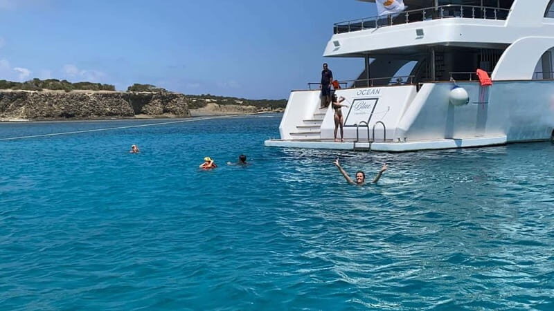 Paphos: Blue Lagoon Cruise-BBQ Lunch, Open Bar, Slide - Food & Drinks: A Feast on the Water