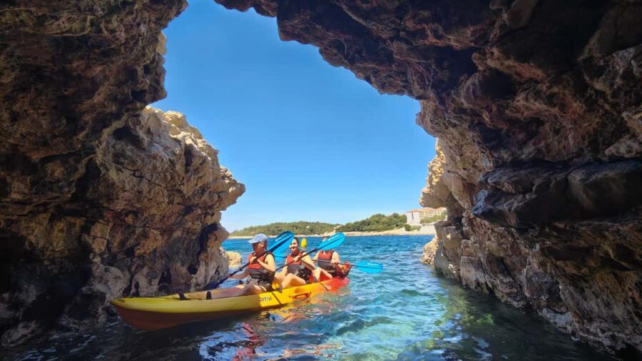 Pula: Cave Kayak Tour, Snorkeling and Island Jumping - The Cave Exploration: A Highlight