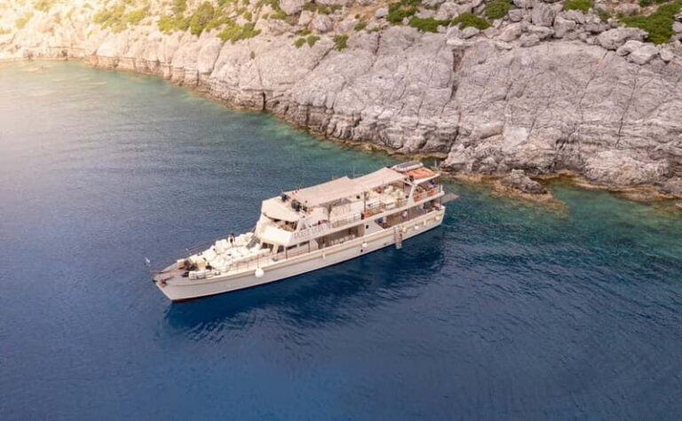 Rhodes: Beach Gem Exploration Cruise with Lunch & Transfer - Comfortable Boarding at Mandraki Harbour