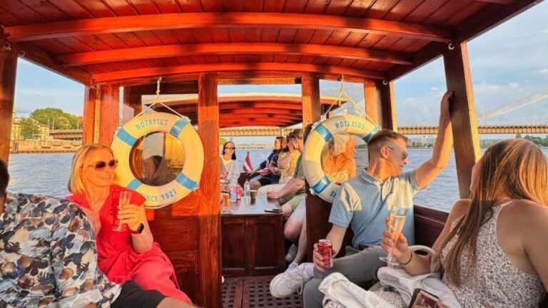 Riga: Canal Boat Tour with Welcome Drink & Audio Guide - Landmark Highlights