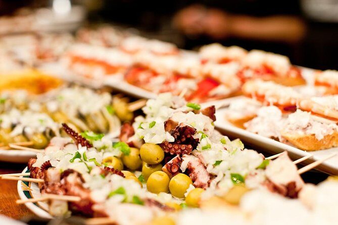 San Sebastian Evening Pintxo Tour with Wine - The Pintxos Venues: Six Iconic Stops