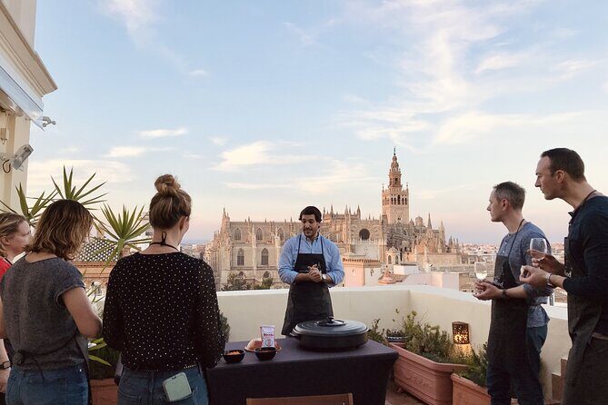 Sevilla: Rooftop Paella Cooking Class & 30-minute expert Q&A - The Sum Up