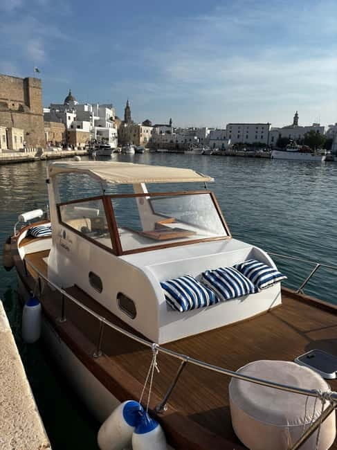 Wooden Gozzo Tour with Aperitif Towards the Beautiful Coast of Polignano - The Experience on Board: Comfort, Drinks, and Atmosphere