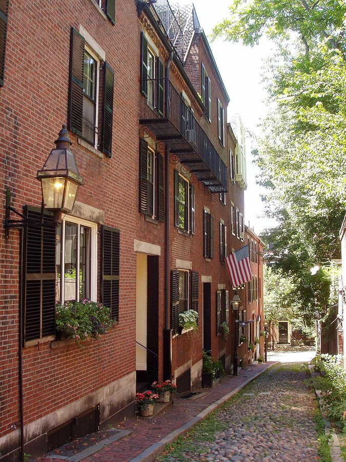 Cobblestone Acorn Street in Beacon Hill Boston with brick row houses