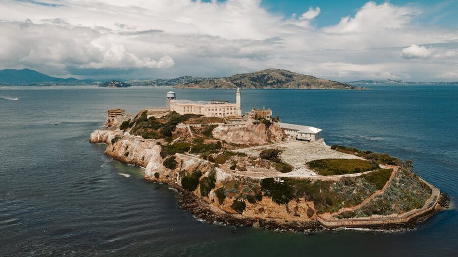 Aerial view of Alcatraz Island showing the cellhouse and surrounding Bay