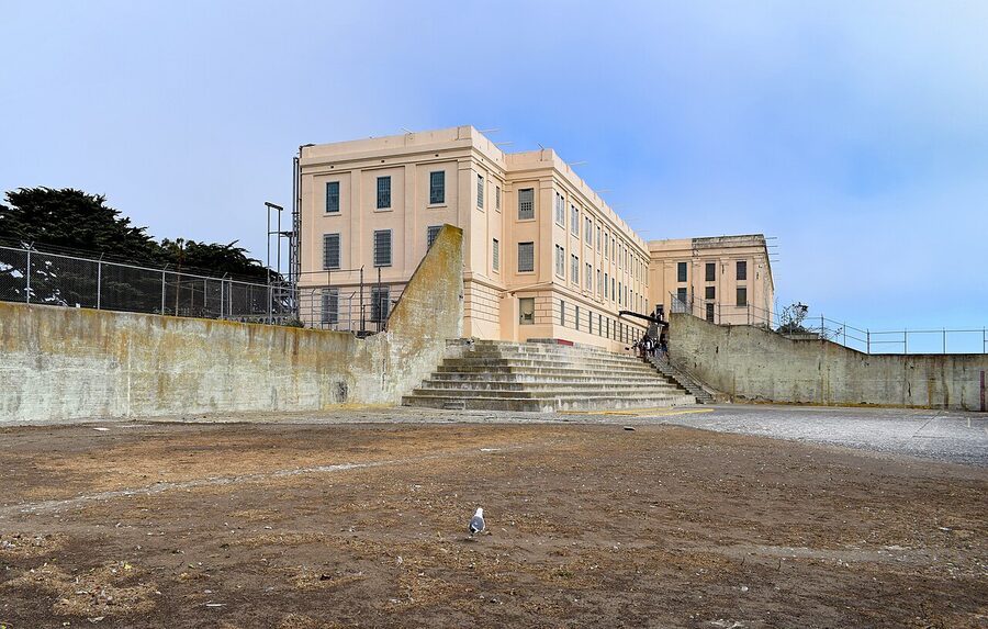 Alcatraz recreation yard surrounded by concrete walls