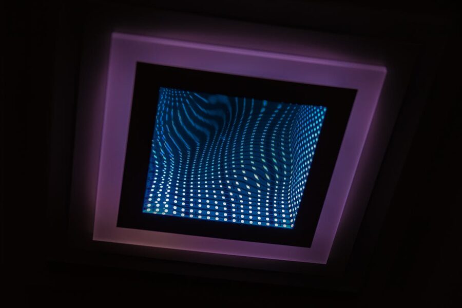 Illuminated infinity mirror creating mesmerizing light effect