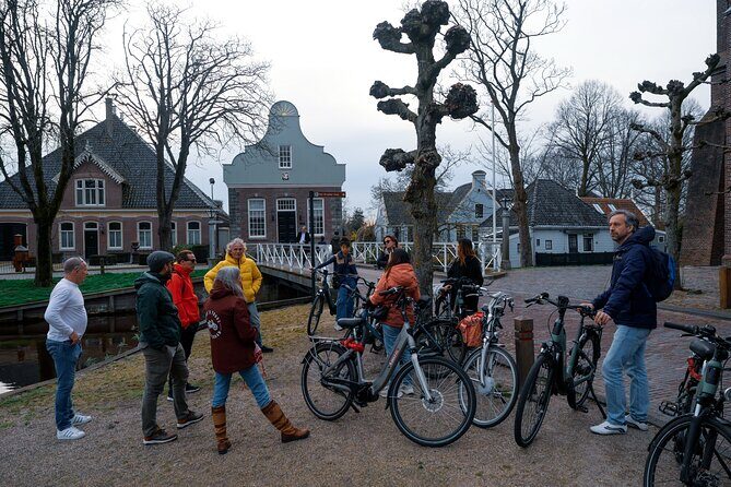 Amsterdam E Bike Tour to the Windmills of Zaanse Schans - Iconic Windmills & Zaandam Charm