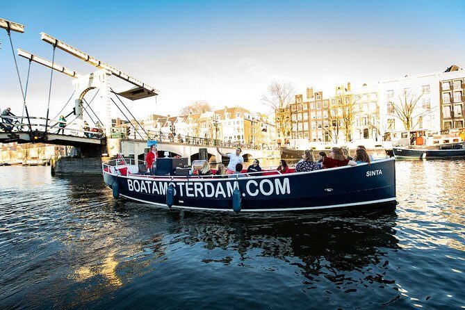 Amsterdam Open Boat Cruise in Old City Center with Live Guide - Deep Dive into the Details
