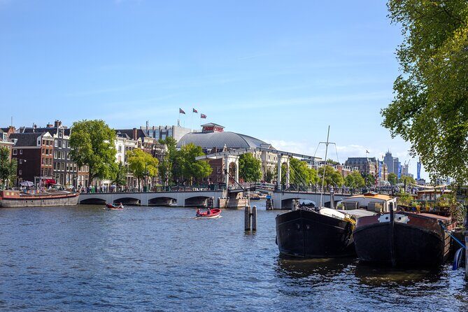 Amsterdam Walking Tour: Urban Legends & History with local guide - Exploring the Itinerary
