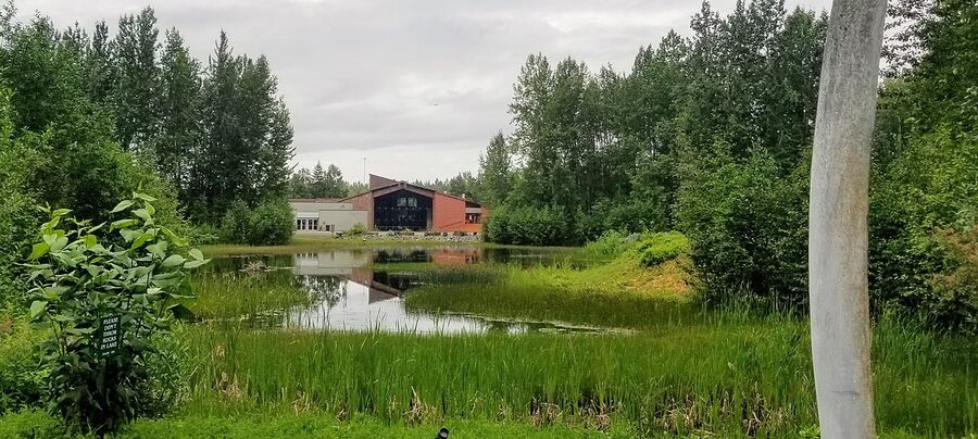 Alaska Native Heritage Center in Anchorage viewed across Lake Tiulana