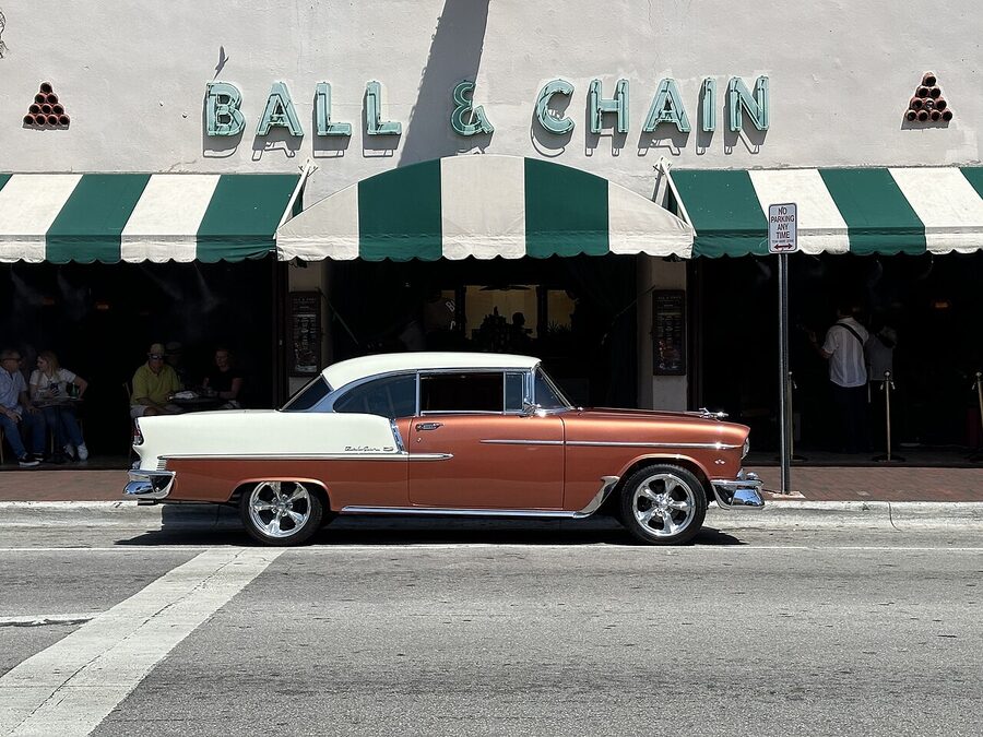 A classic antique car parked on Calle Ocho in Little Havana