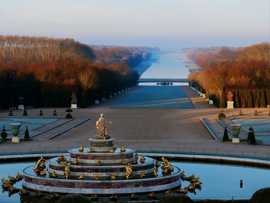 The Apollo Fountain in the Versailles Gardens with autumn foliage