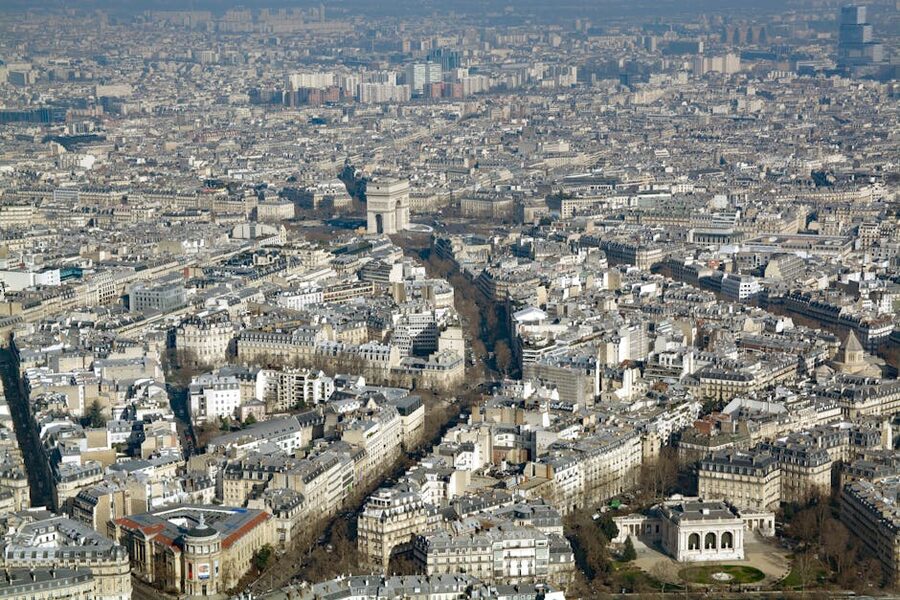 Aerial view of Paris with Arc de Triomphe and surrounding buildings
