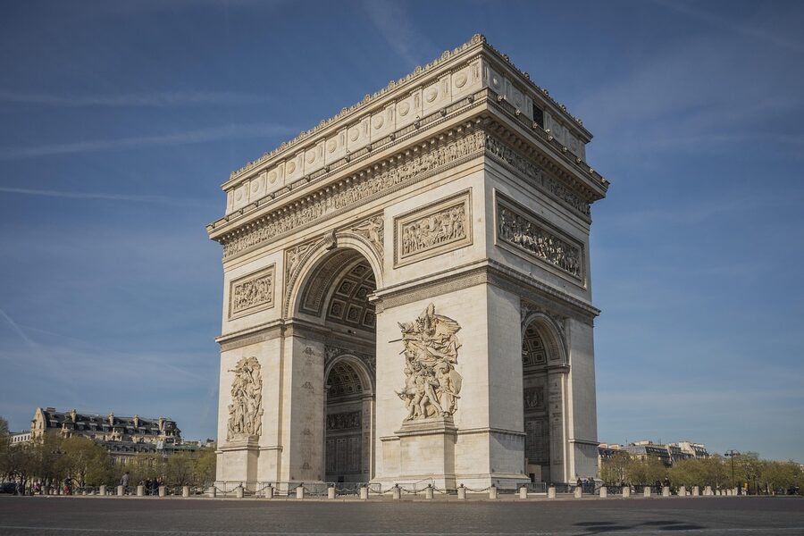 Arc de Triomphe in Paris from a tourism viewpoint with surrounding traffic