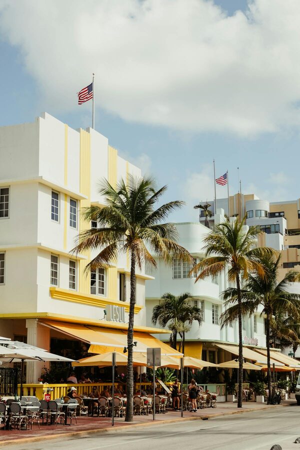 Art Deco buildings with palm trees on Ocean Drive Miami Beach