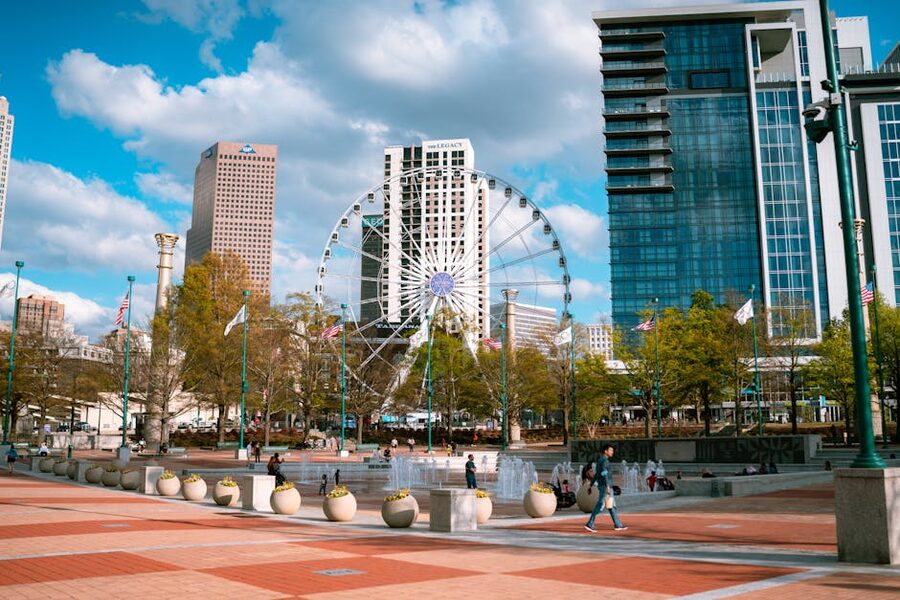 Centennial Olympic Park in Atlanta with skyscrapers and Ferris wheel