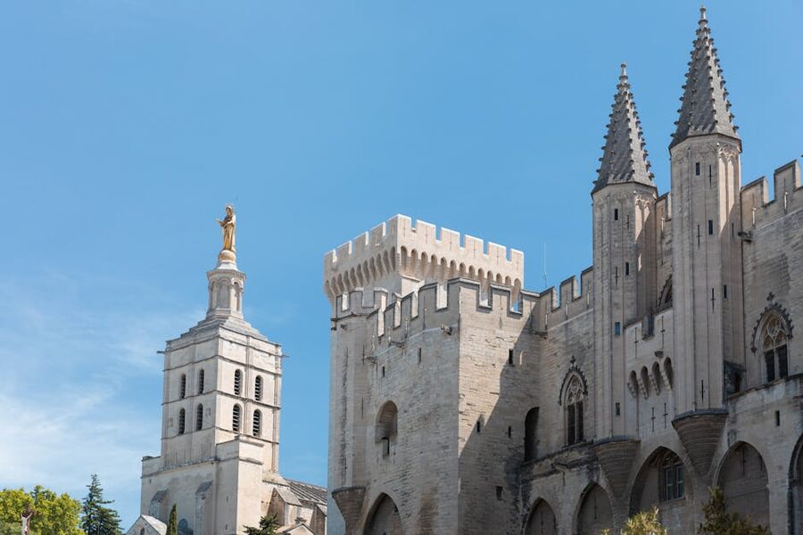 Palace of the Popes in Avignon under blue sky