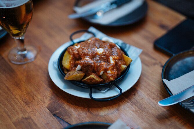 Barcelona Tapas Food Walking Tour with Wine in El Born - The Guide and Group Dynamics