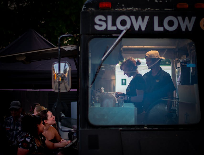 Austin food truck serving customers at night