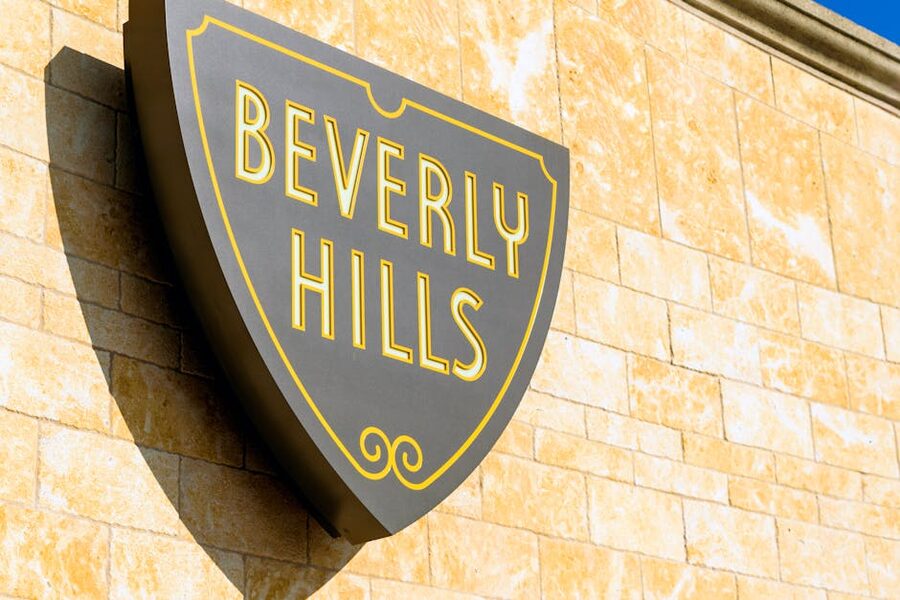 Beverly Hills sign on a sunlit building