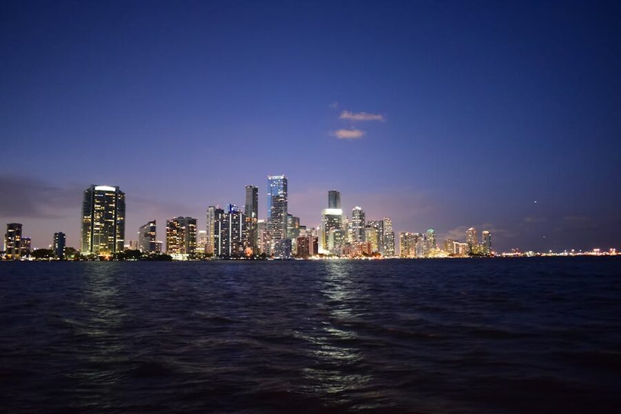 Miami skyline reflecting on Biscayne Bay at twilight