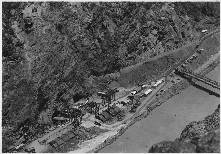 Black Canyon during Hoover Dam construction in the 1930s showing diversion tunnel intake portals
